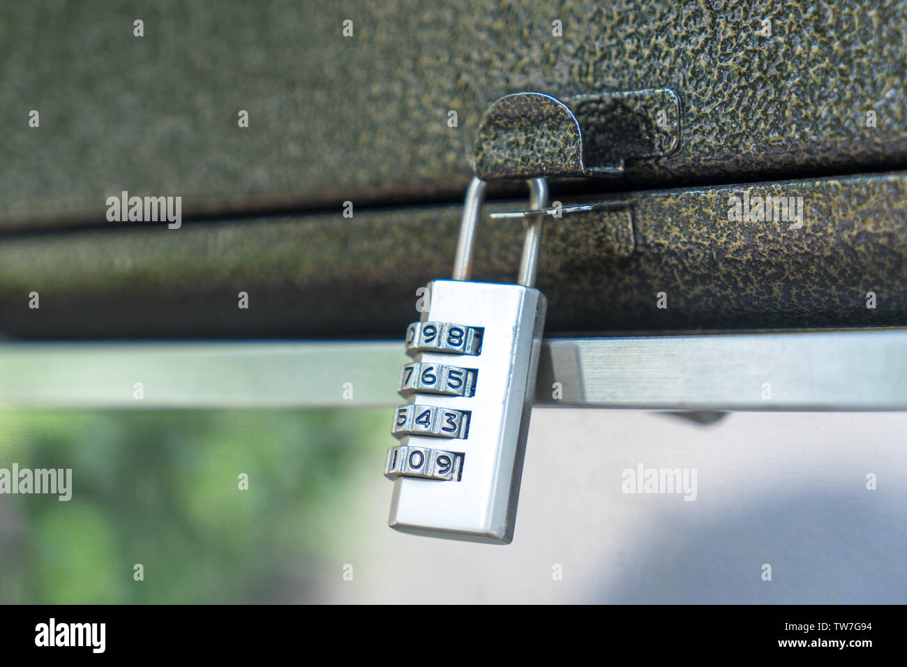 combination locker on black leather luggage Stock Photo - Alamy