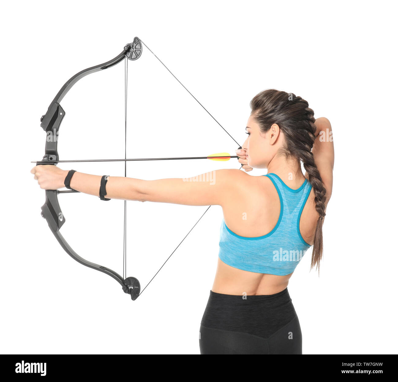 Sporty young woman practicing archery on white background Stock Photo ...