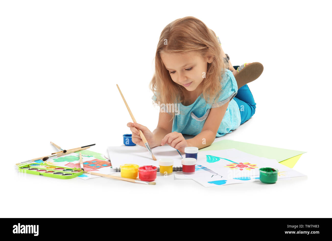 Little girl painting against white background Stock Photo - Alamy