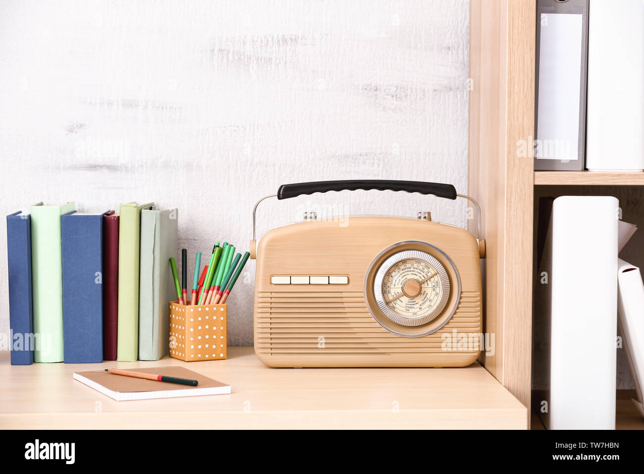 Stylish radio receiver on office table Stock Photo - Alamy
