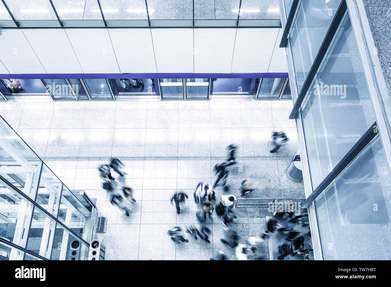 Busy people walking by modern building Stock Photo - Alamy