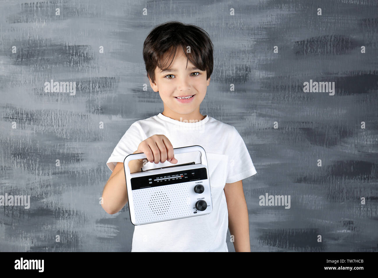 Boy with radio hi-res stock photography and images - Alamy