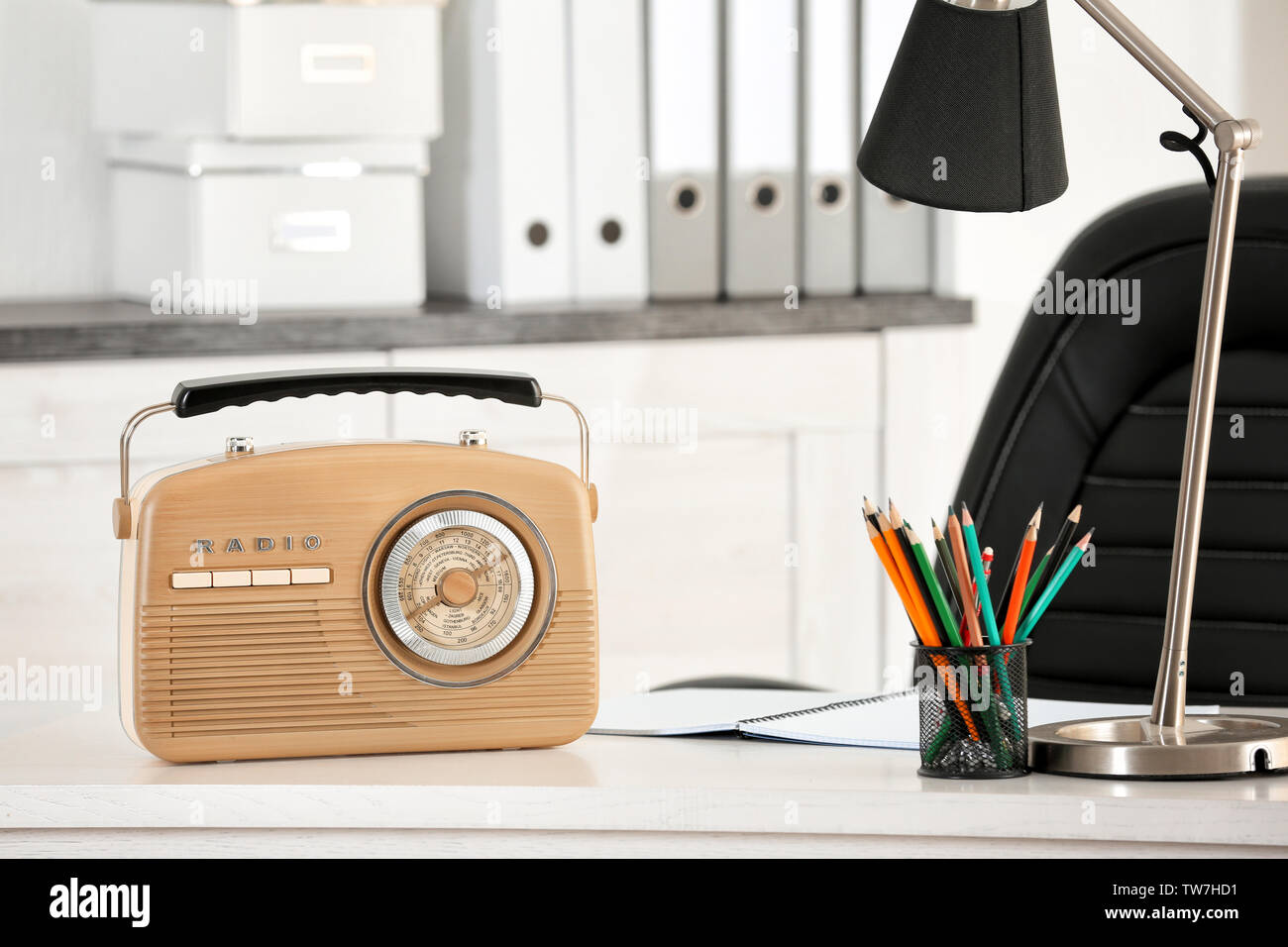 Stylish radio receiver on office table Stock Photo - Alamy