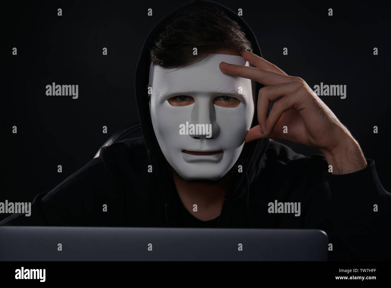 Hacking computer masked data hi-res stock photography and images - Alamy
