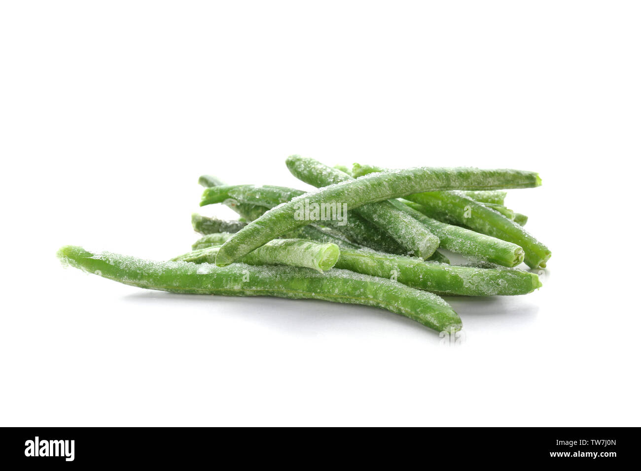 Frozen green beans on white background Stock Photo - Alamy