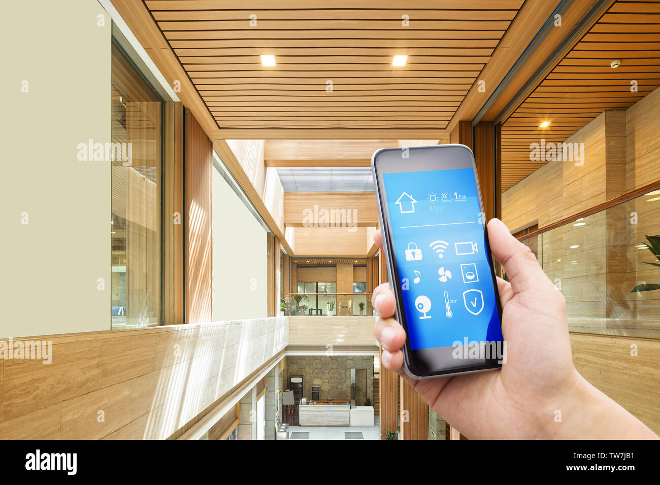 smart phone with smart home with modern hall Stock Photo - Alamy