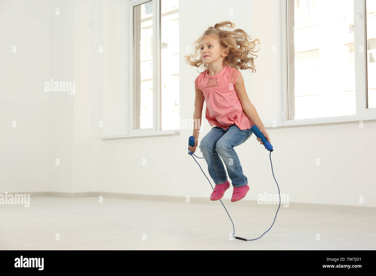 Girl skipping rope hi-res stock photography and images - Alamy