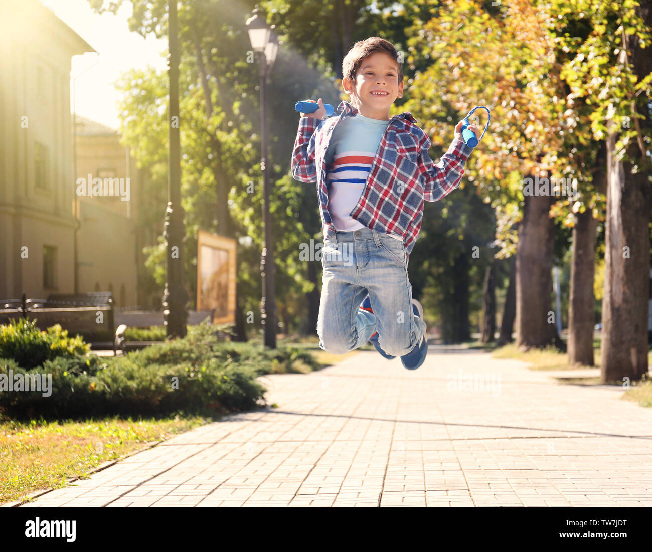 Boy skipping rope hi-res stock photography and images - Alamy