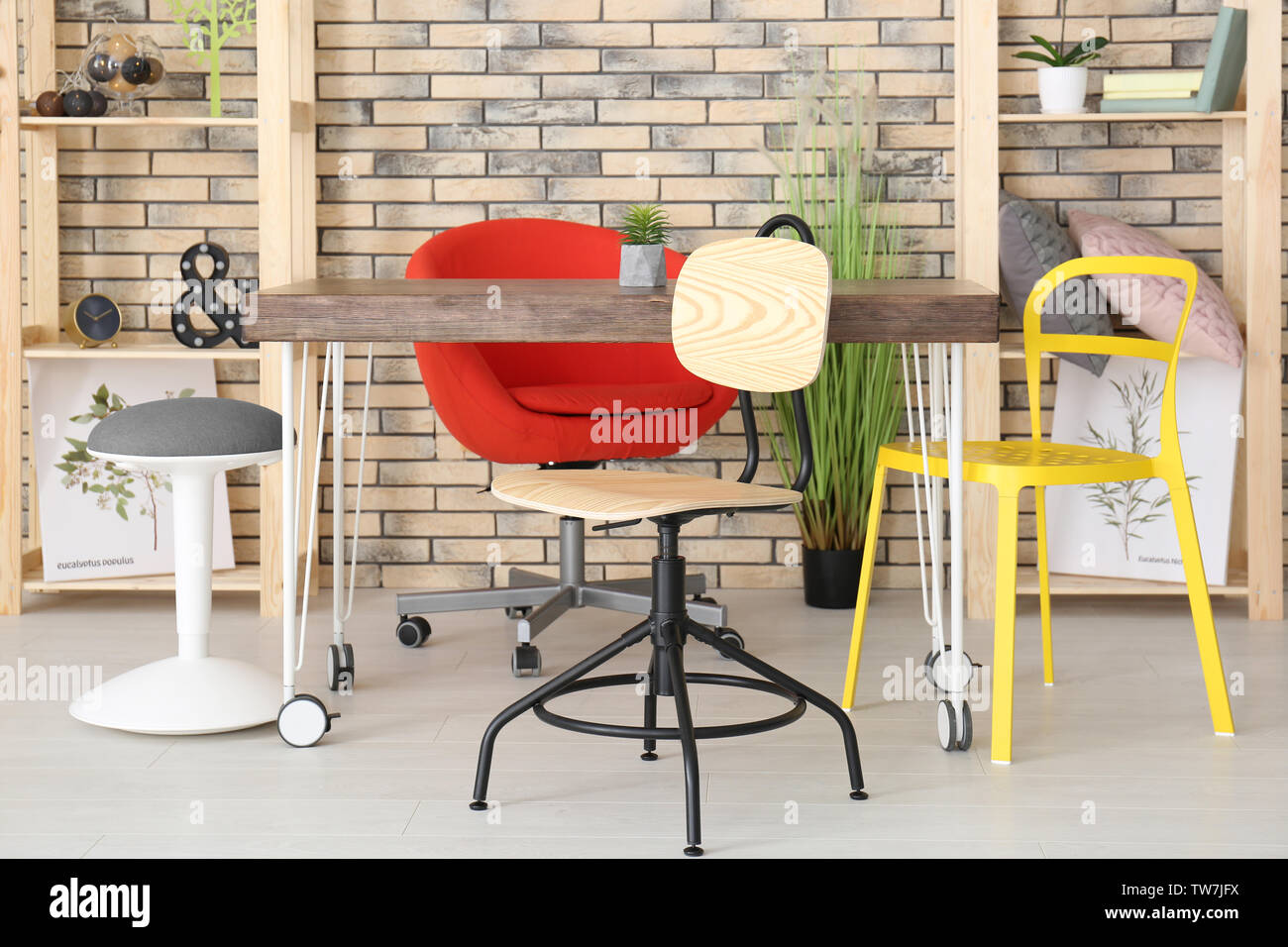 Modern office interior with wooden table and chairs Stock Photo - Alamy