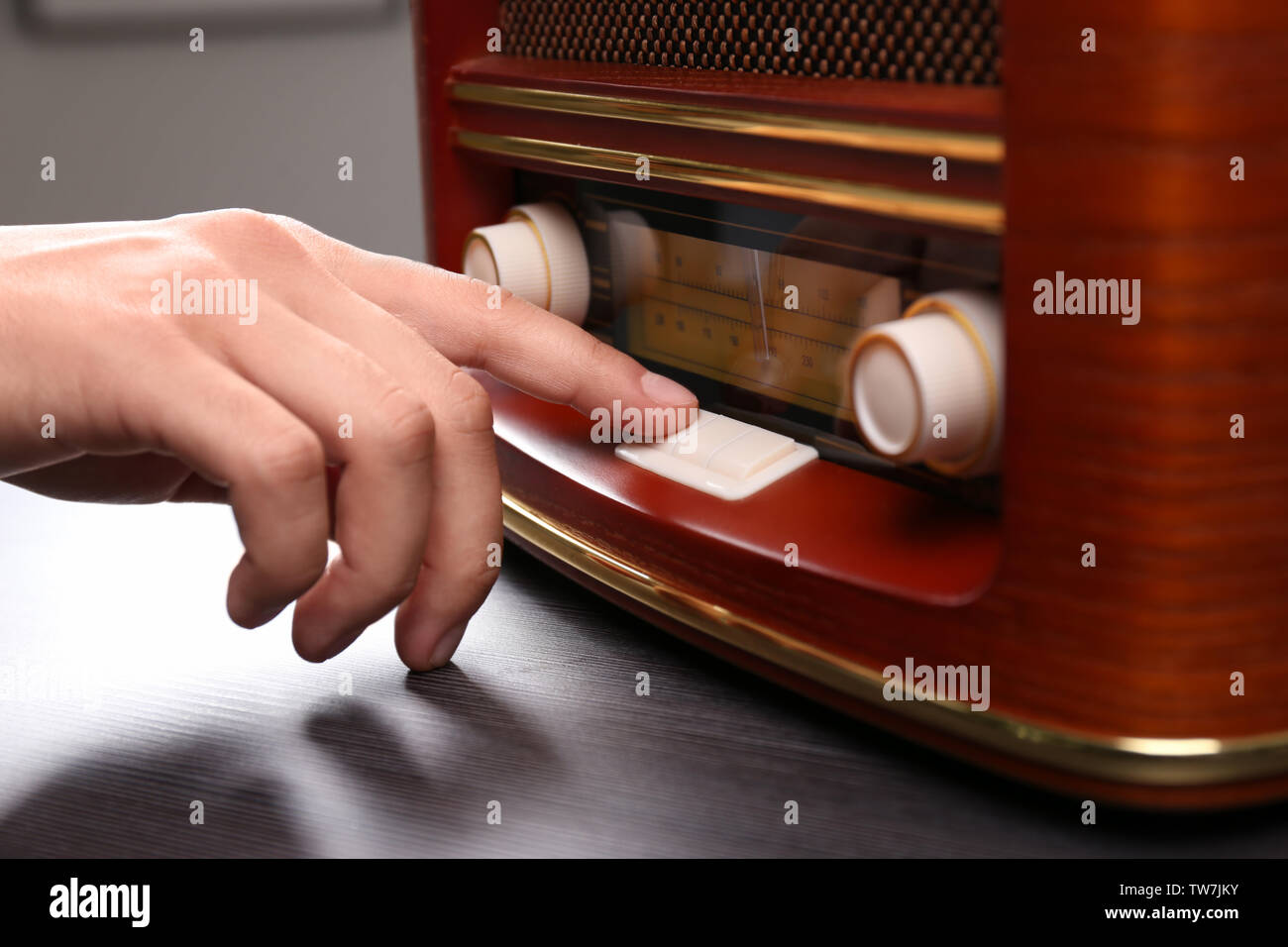 Person listening to transistor radio hi-res stock photography and ...