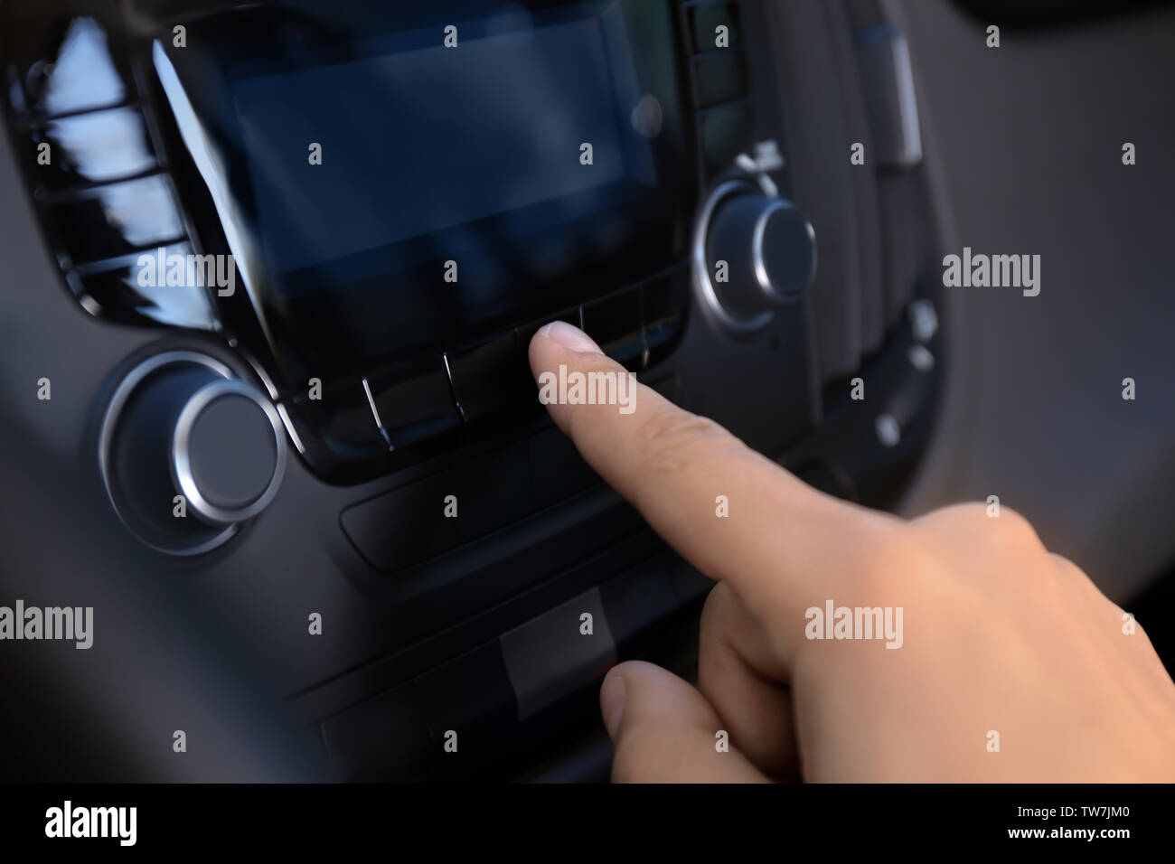 Man tuning car radio, closeup Stock Photo - Alamy