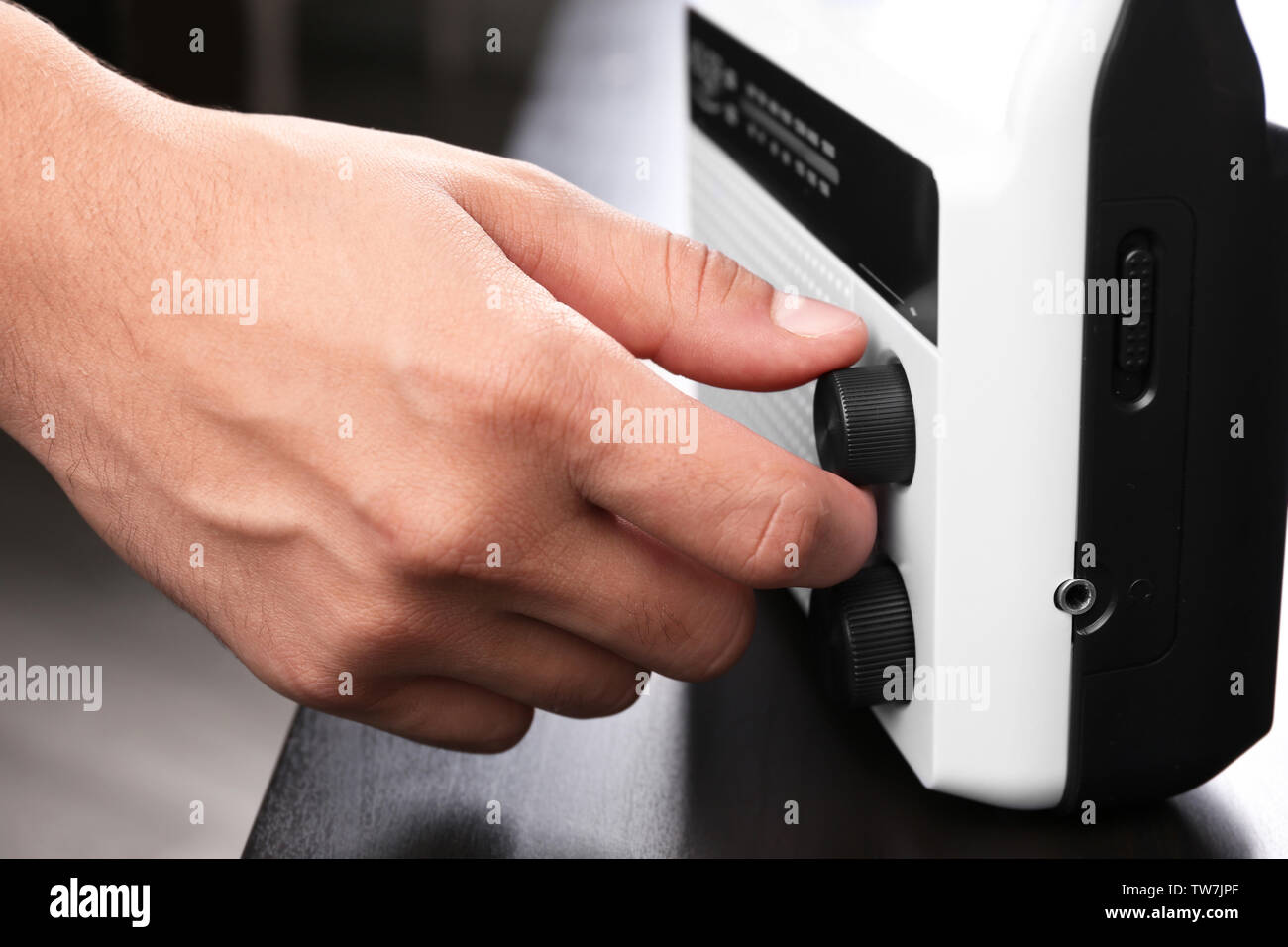 Person listening to transistor radio hi-res stock photography and ...