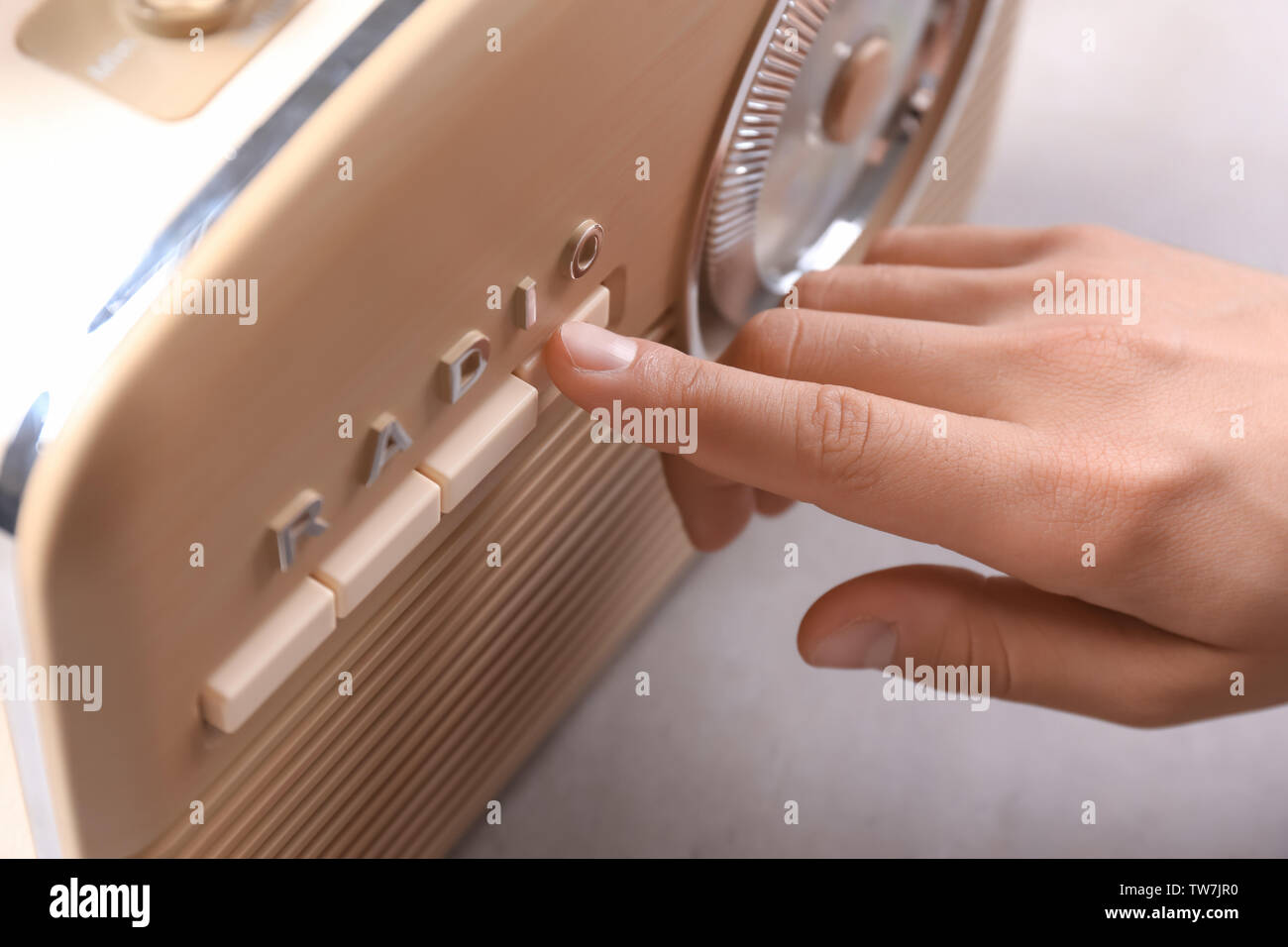 Person tuning retro radio, closeup Stock Photo - Alamy