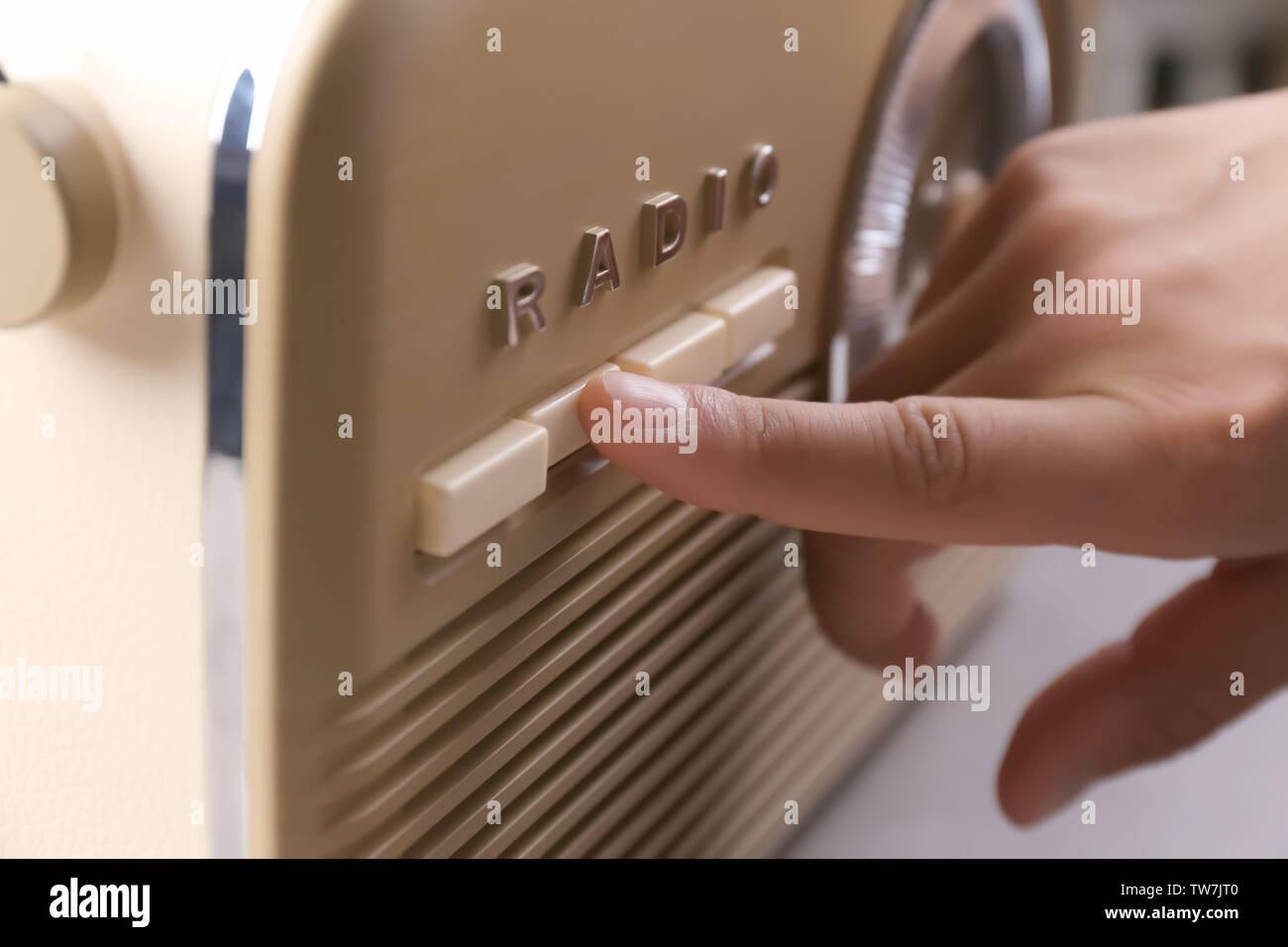 Person listening to transistor radio hi-res stock photography and ...
