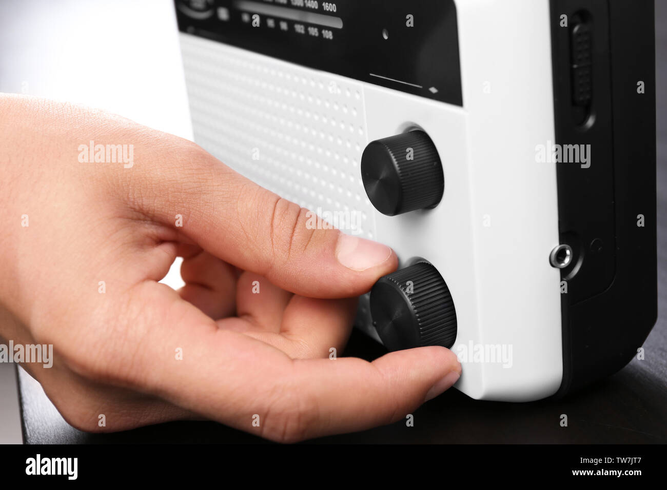 Person listening to transistor radio hi-res stock photography and ...