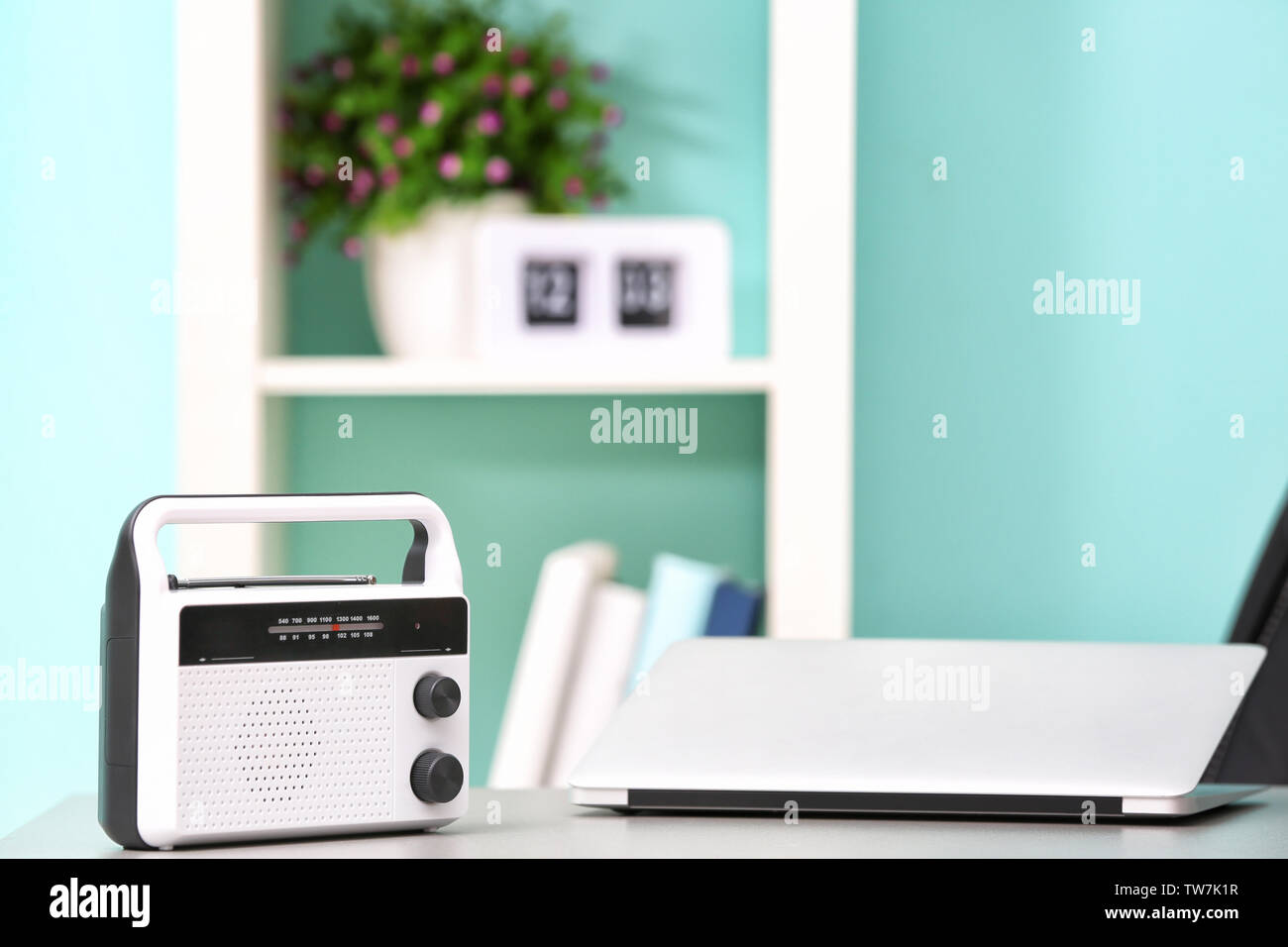 Retro radio on table in room Stock Photo - Alamy
