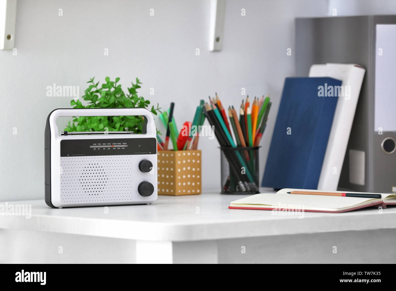Retro radio on table in room Stock Photo - Alamy