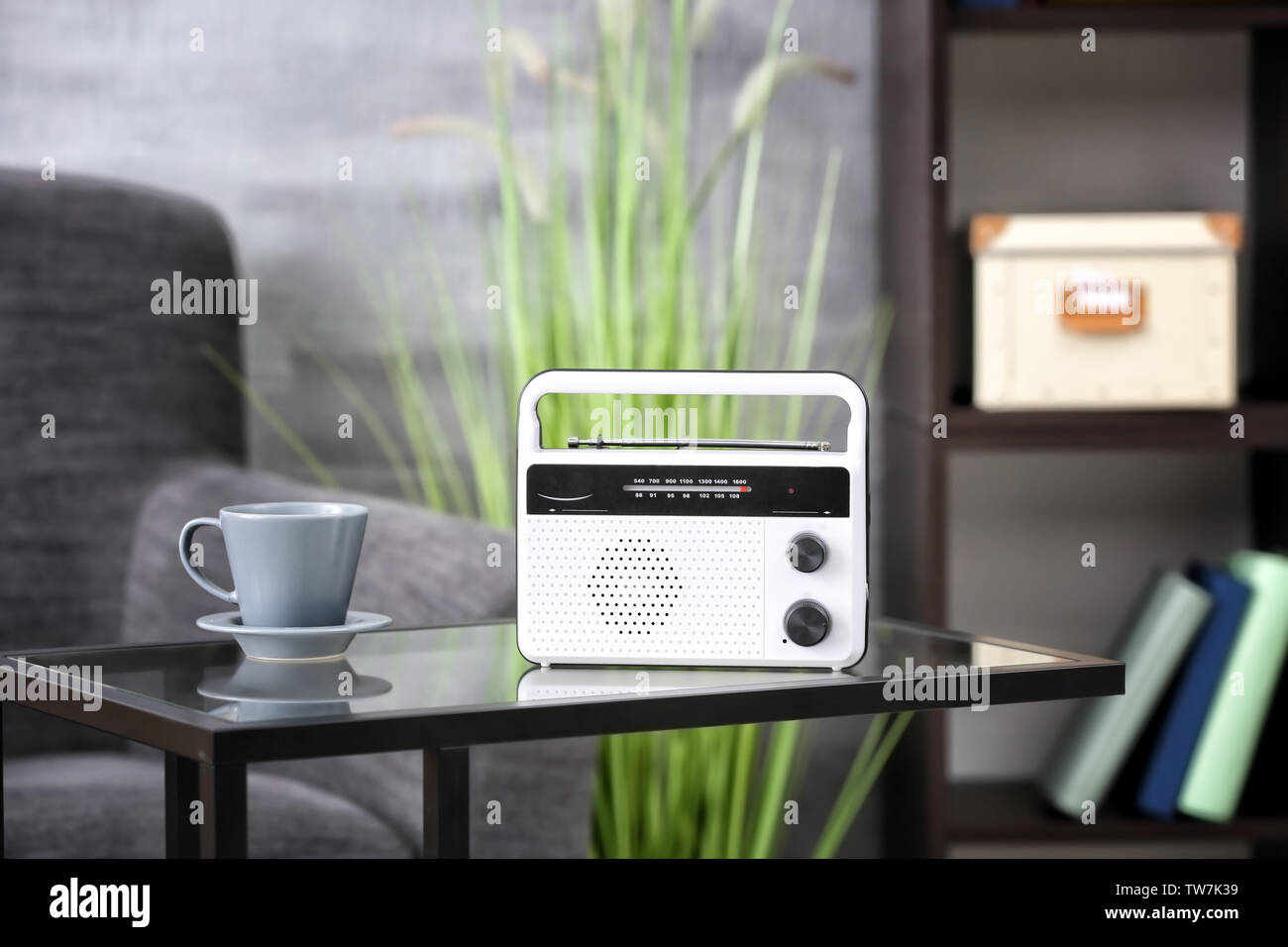 Retro radio on table in room Stock Photo - Alamy