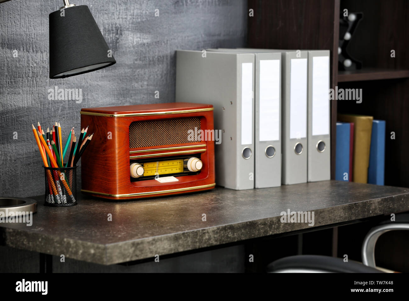 Retro radio on table in room Stock Photo - Alamy