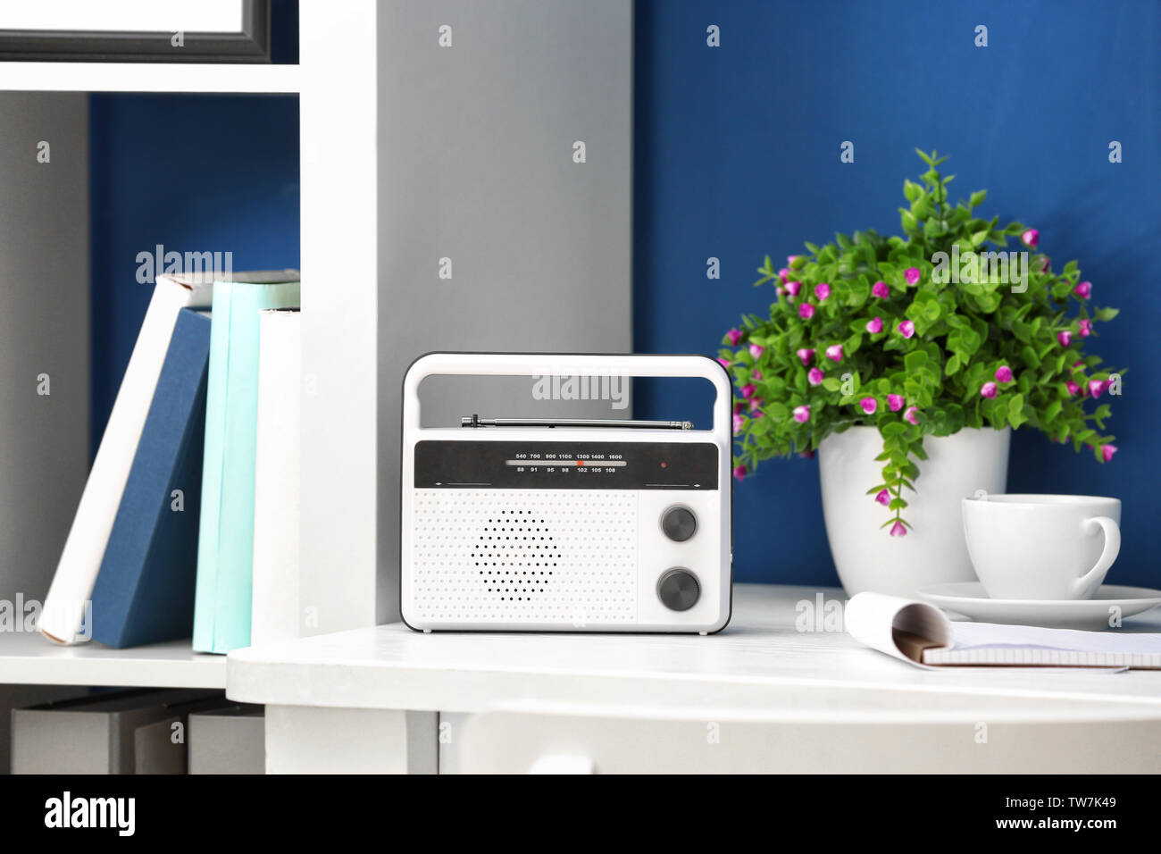 Retro radio on table in room Stock Photo - Alamy