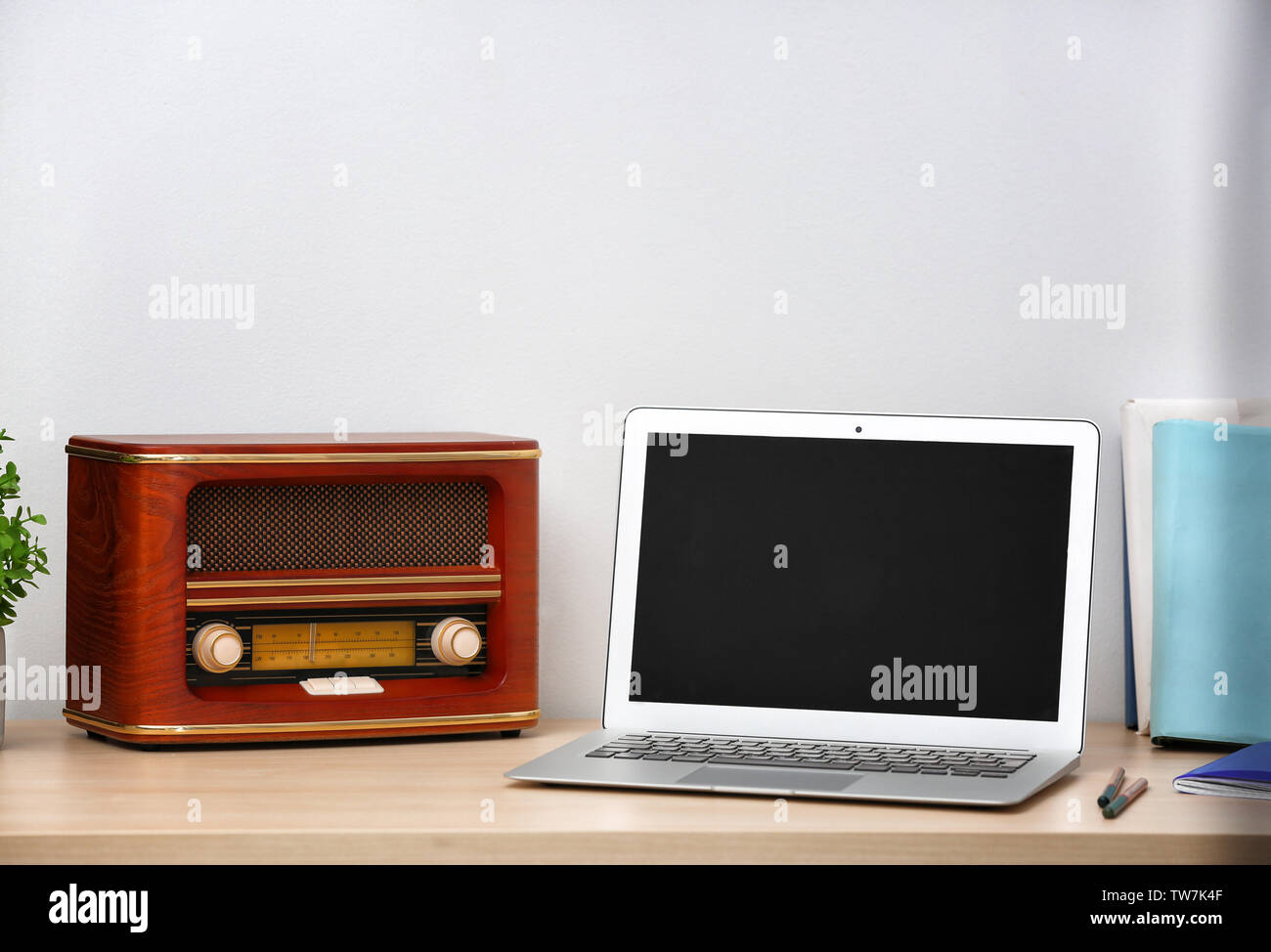 Retro radio on table in room Stock Photo - Alamy