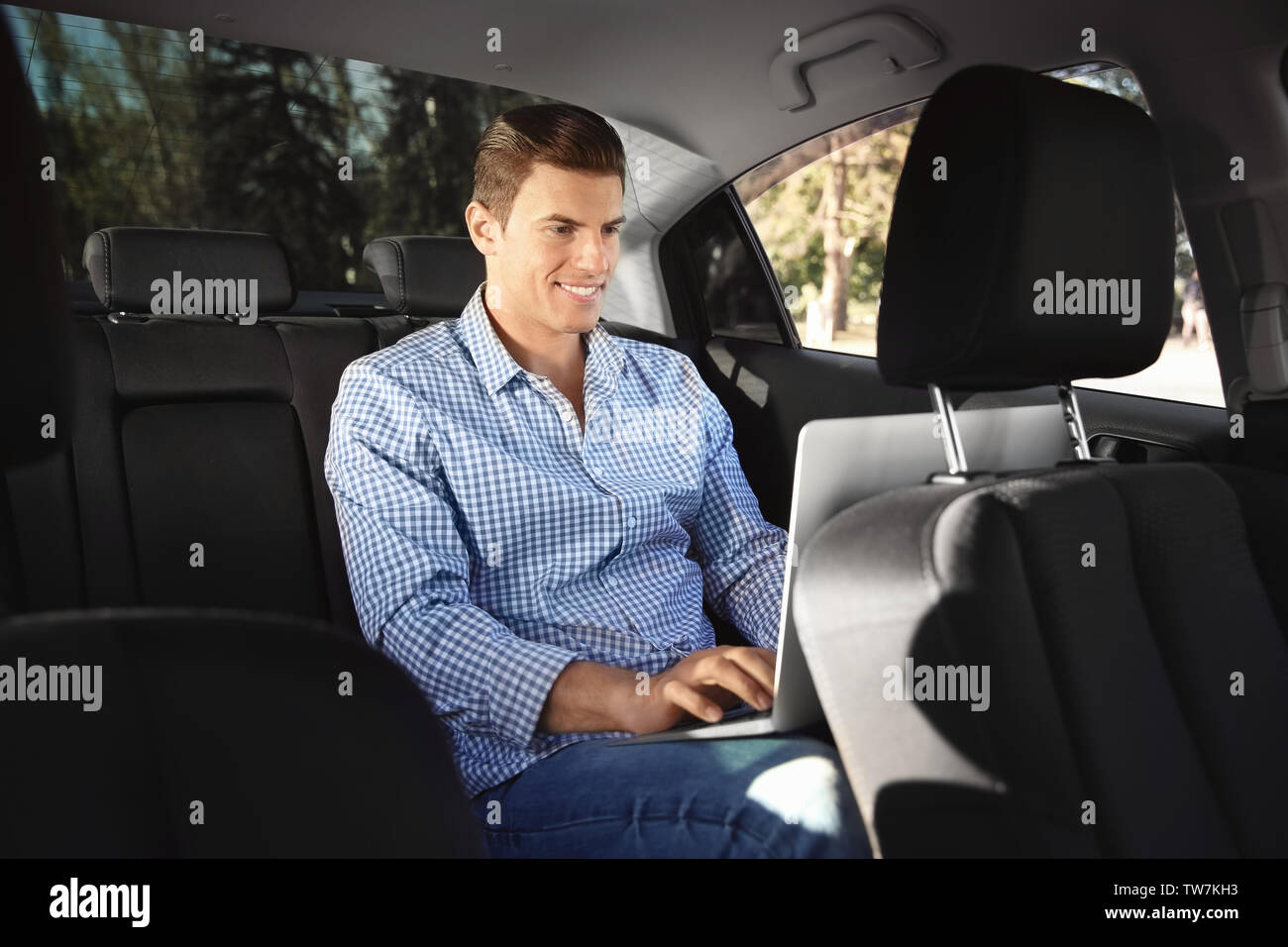 Owner person laptop car hi-res stock photography and images - Alamy