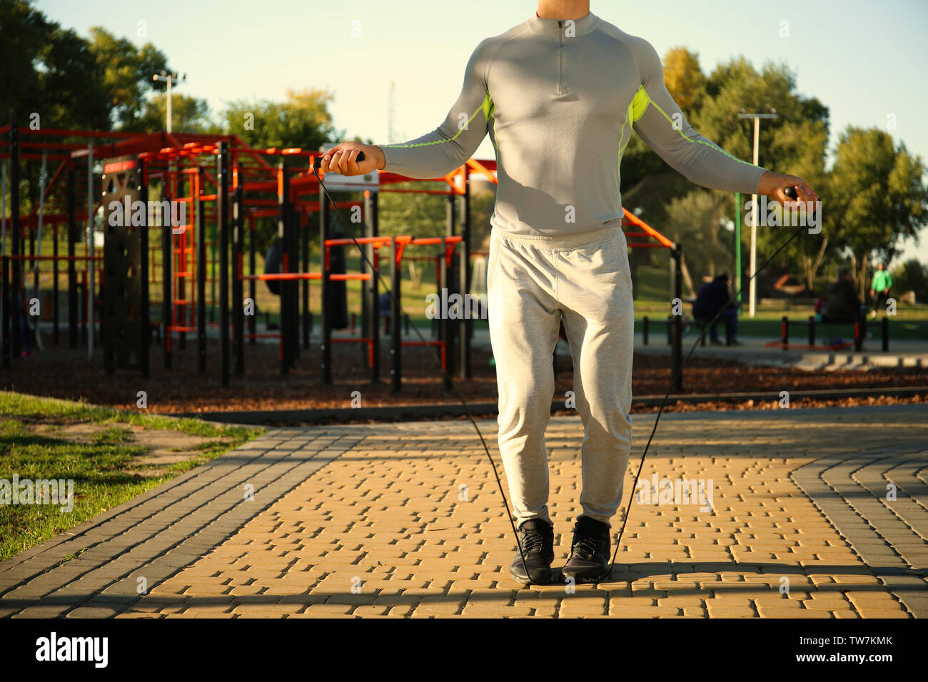 Strong man jumping rope in hi-res stock photography and images - Alamy