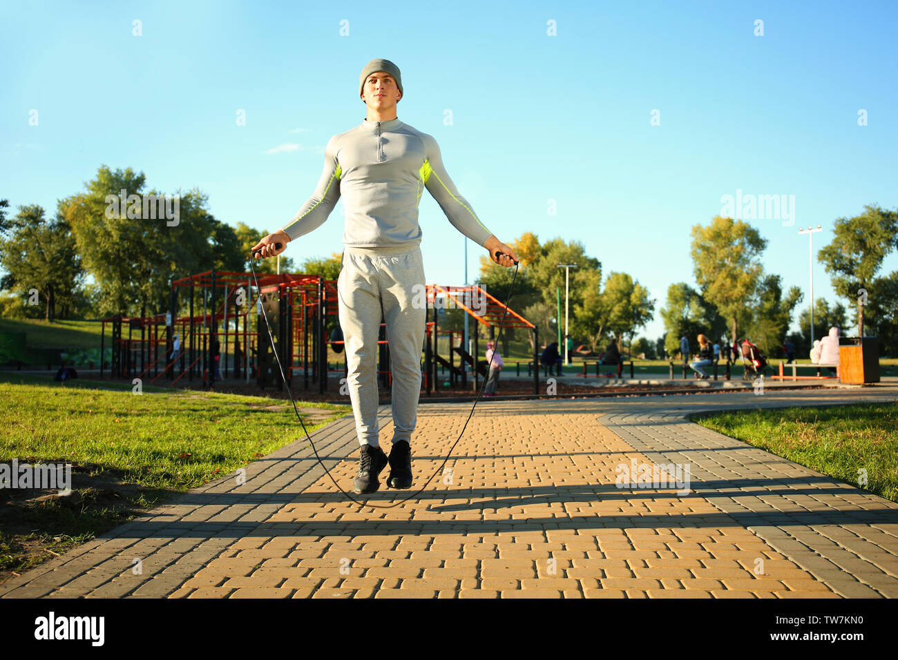 Strong man jumping rope in hi-res stock photography and images - Alamy