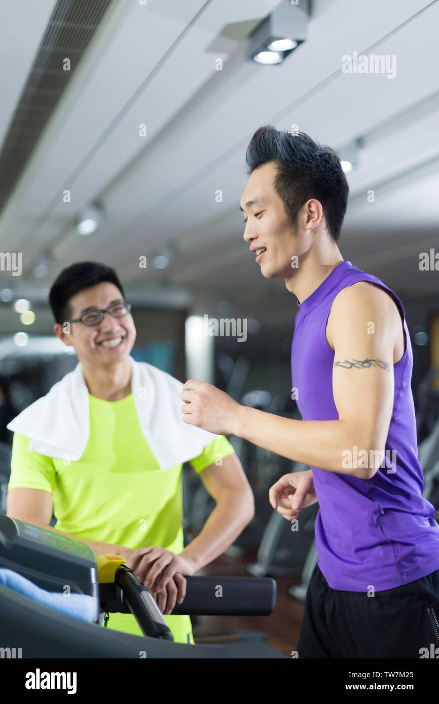 young asian people working out in modern gym Stock Photo - Alamy