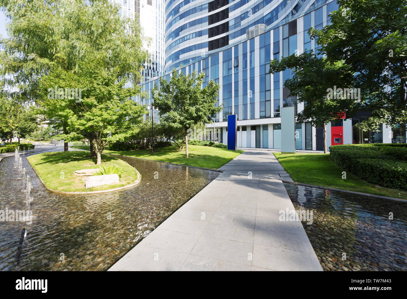 footpath around modern office building Stock Photo - Alamy