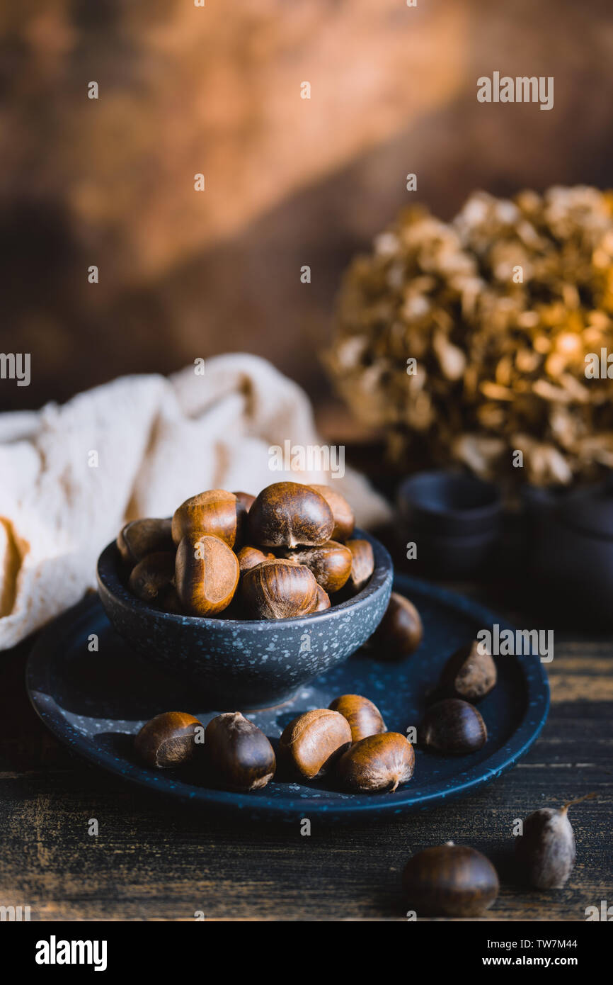 Piles of stir-fried chestnuts Stock Photo - Alamy