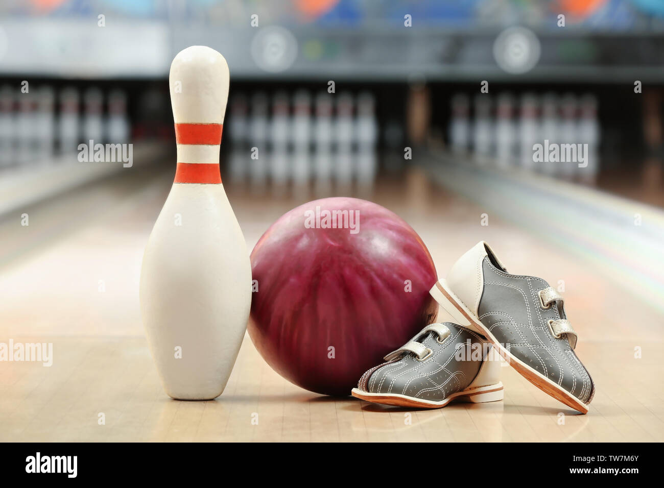 Shoes, pin and ball on floor in bowling club Stock Photo - Alamy