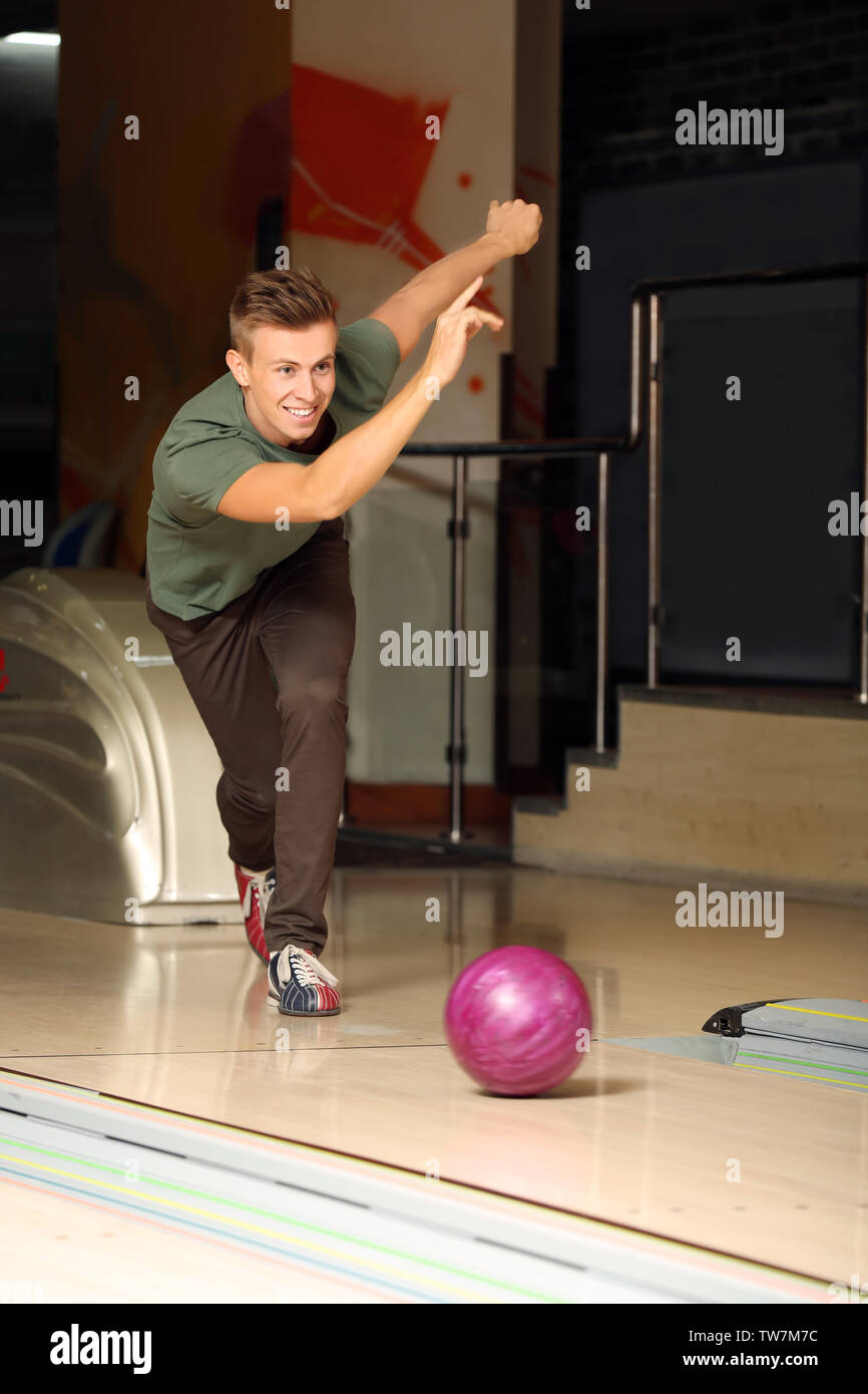 Handsome young man at bowling club Stock Photo - Alamy