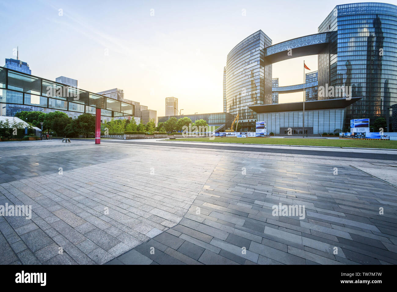 modern square and skyscrapers under sunbeam Stock Photo - Alamy