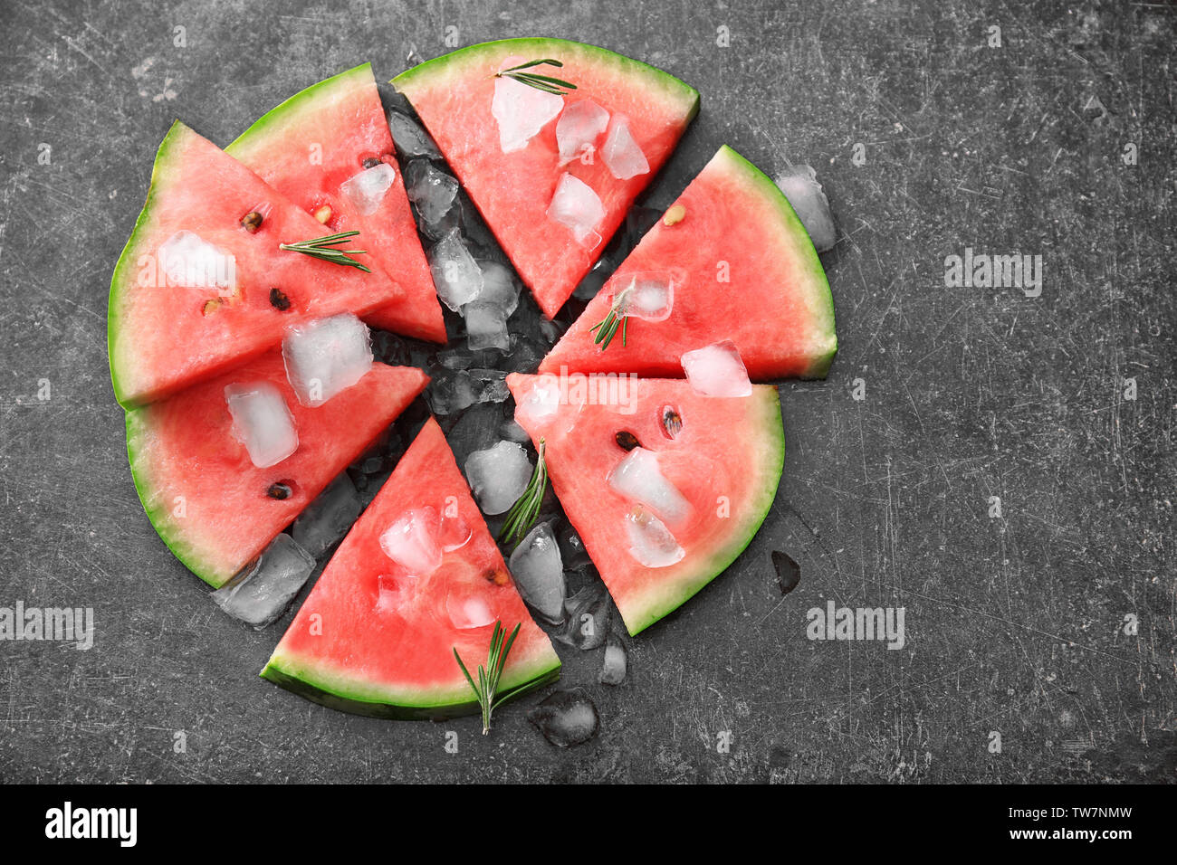 Tasty sliced watermelon on grey background Stock Photo - Alamy