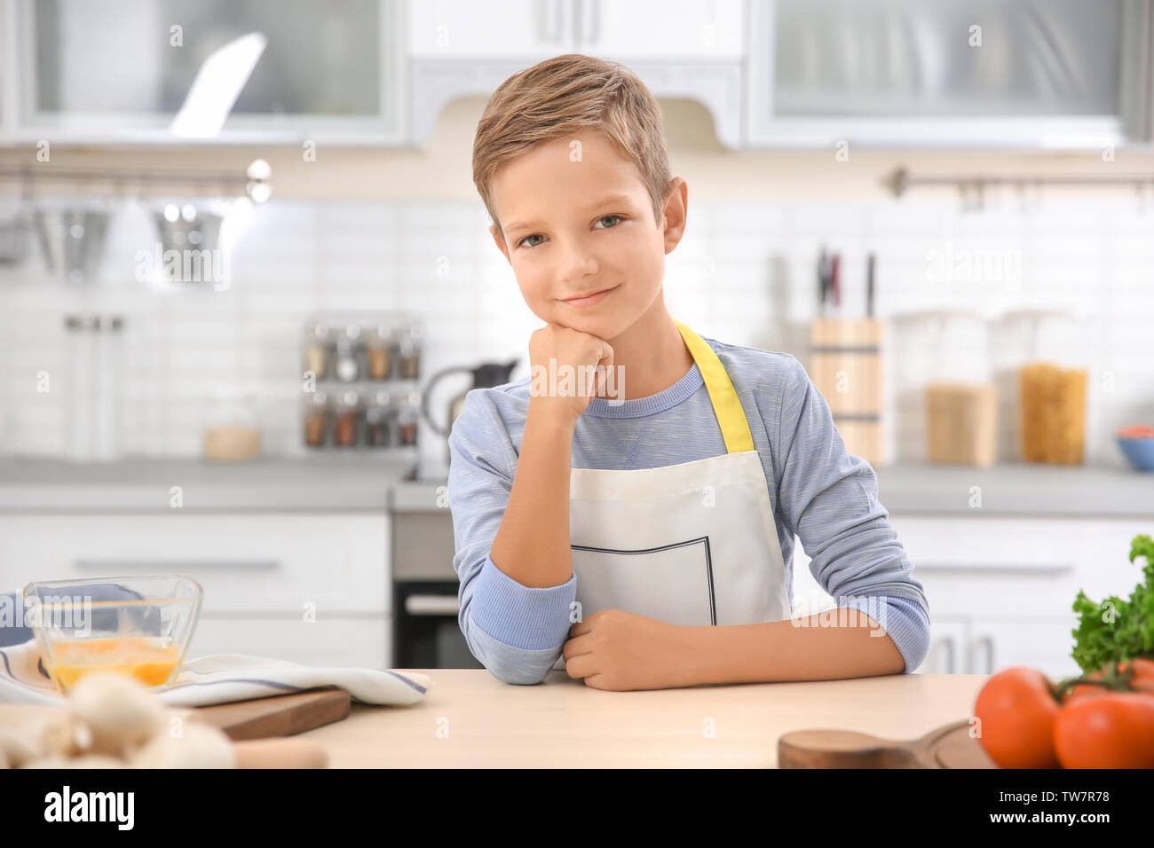 Cute little boy in kitchen Stock Photo - Alamy