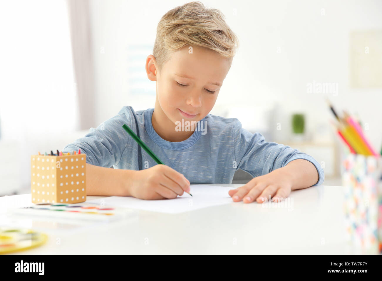 Cute little boy drawing at home Stock Photo - Alamy