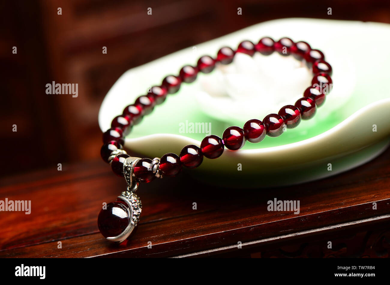 Garnet hand bracelet Stock Photo - Alamy