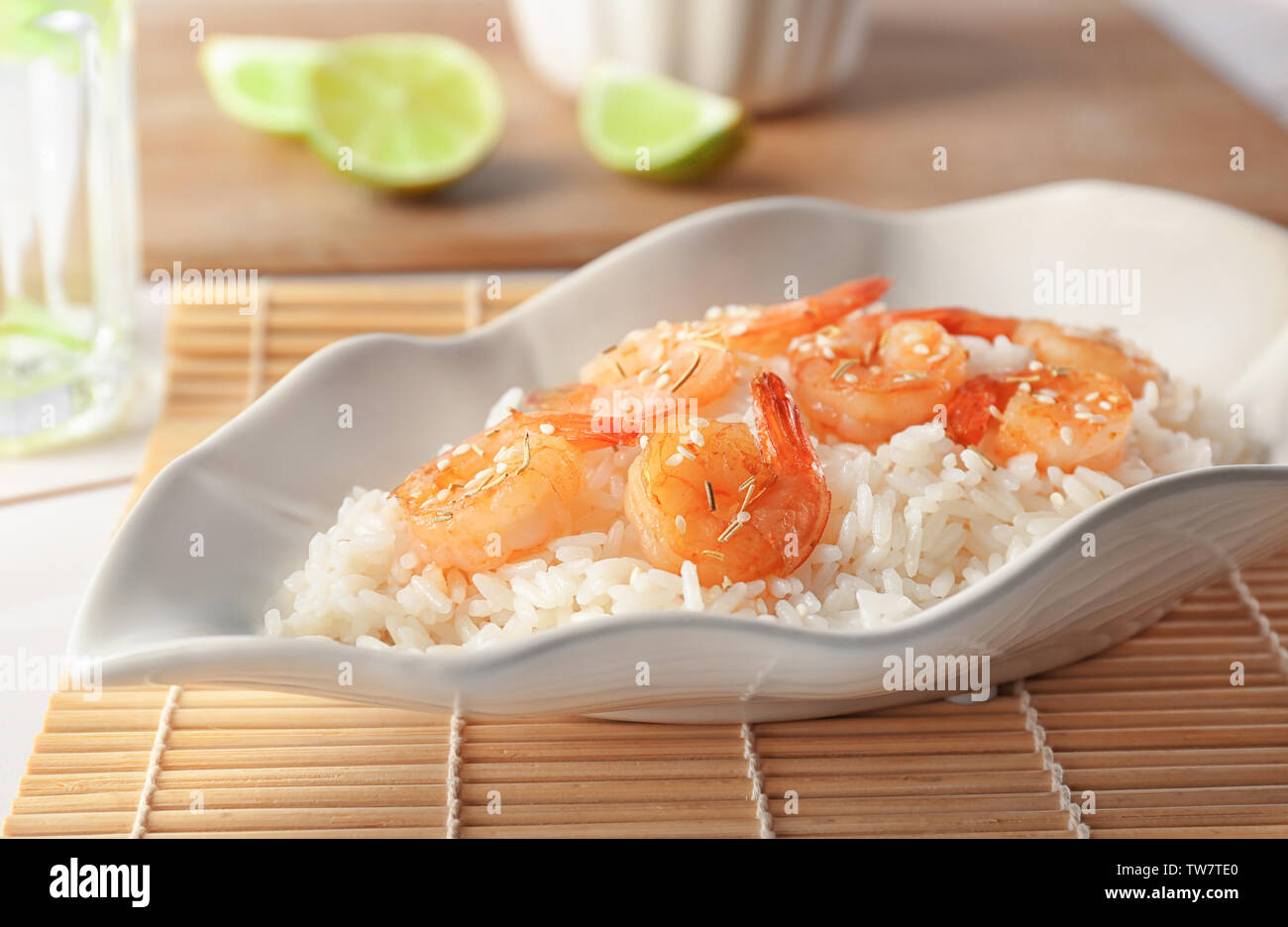Plate with delicious shrimp fried rice on table Stock Photo - Alamy