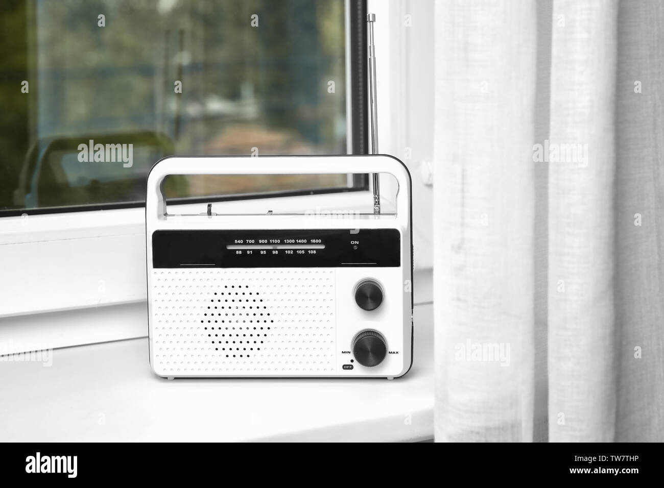 Retro radio on window sill Stock Photo - Alamy