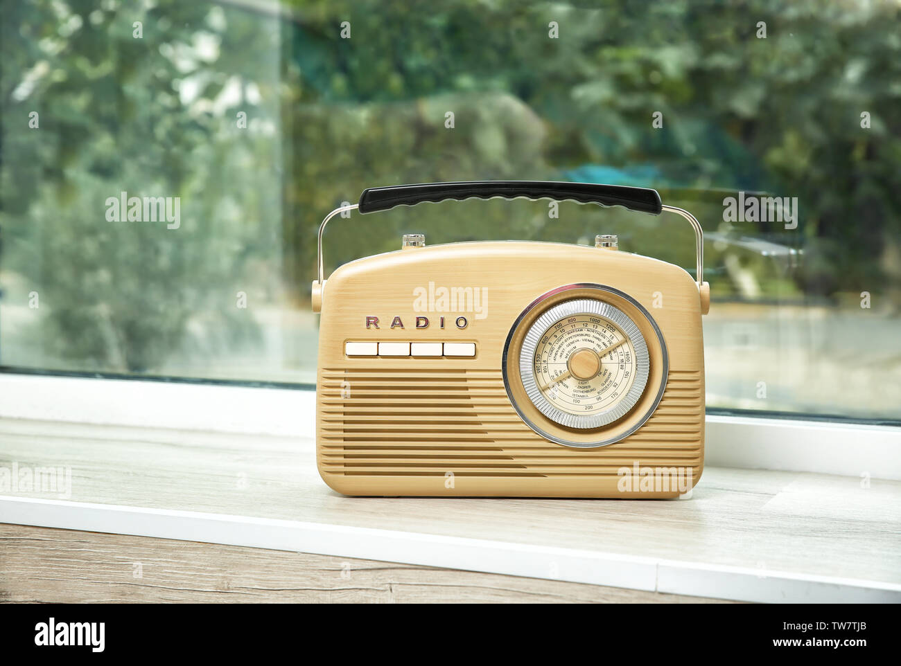Retro radio on window sill Stock Photo - Alamy