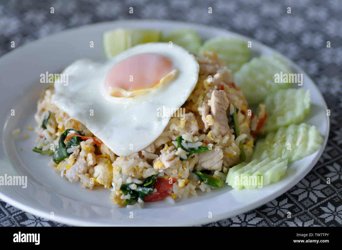 fried rice or stir-fried rice with fried egg and cucumber Stock Photo ...