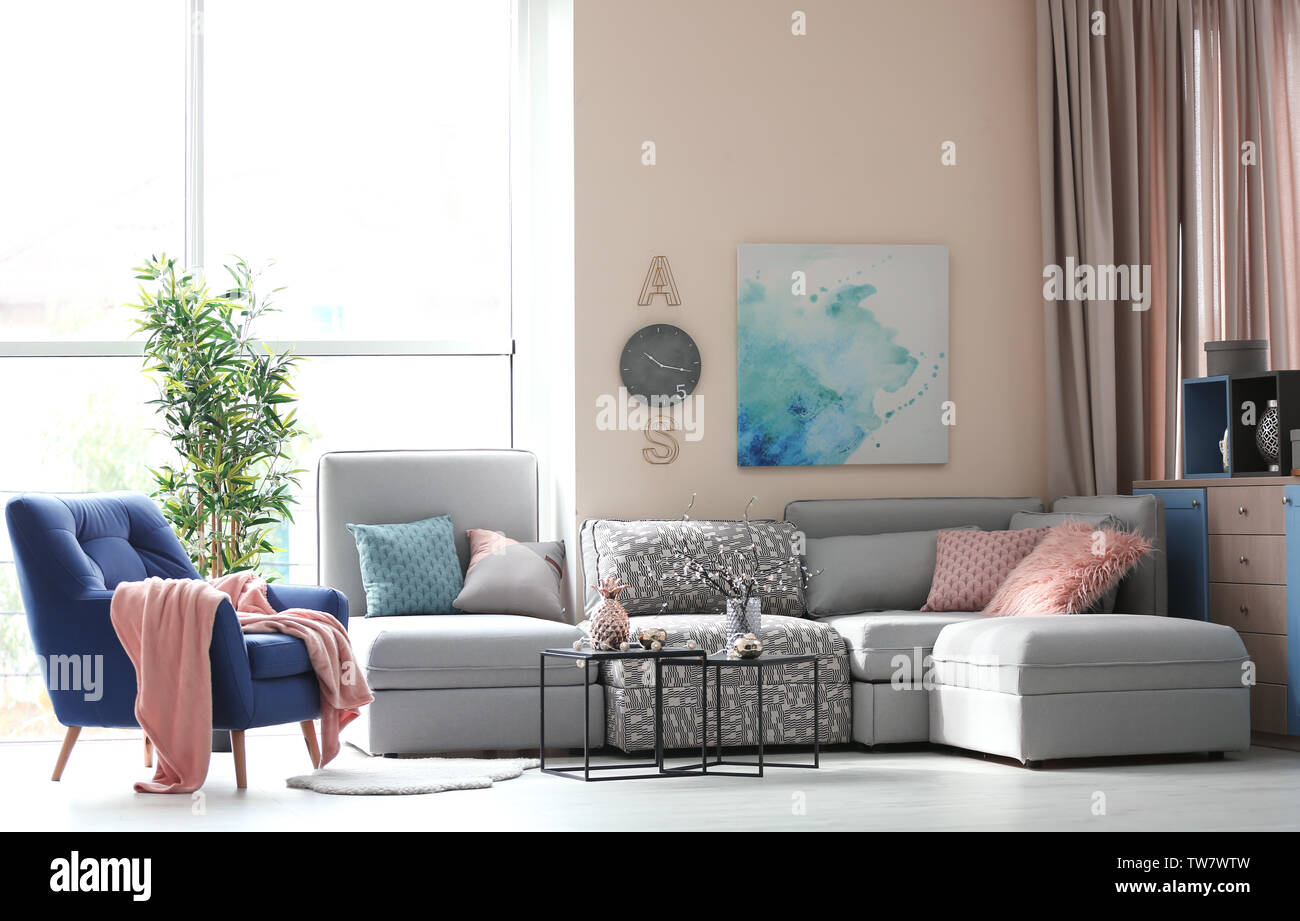 Design of modern living room with comfortable furniture Stock Photo - Alamy