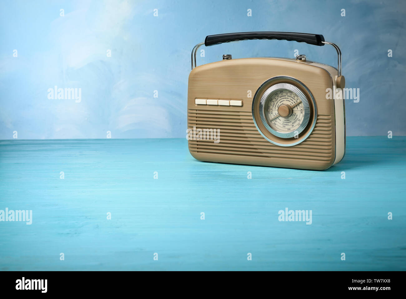 Retro radio on color background Stock Photo - Alamy