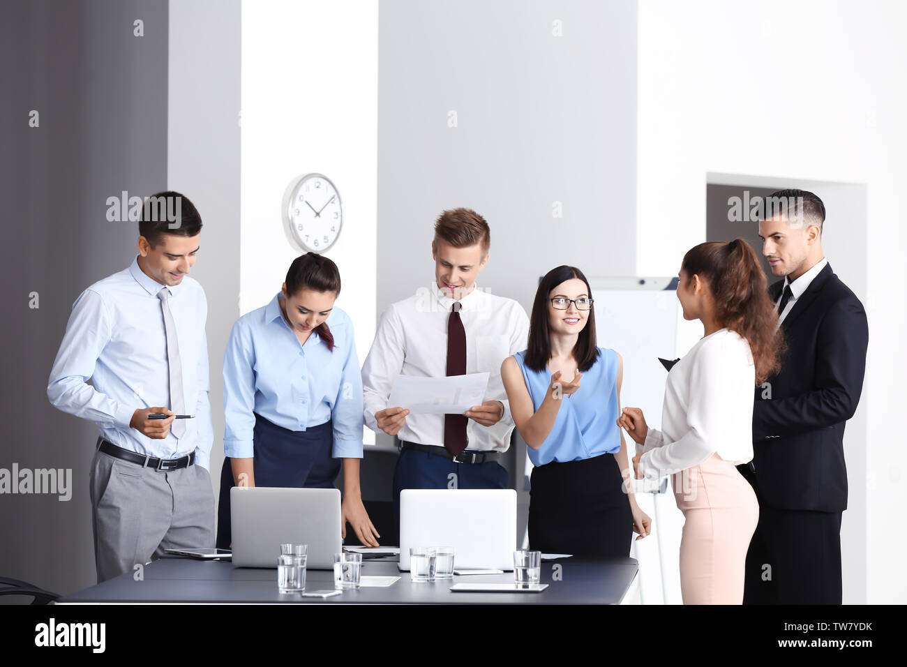 Team of young consulting experts on business meeting in office Stock ...