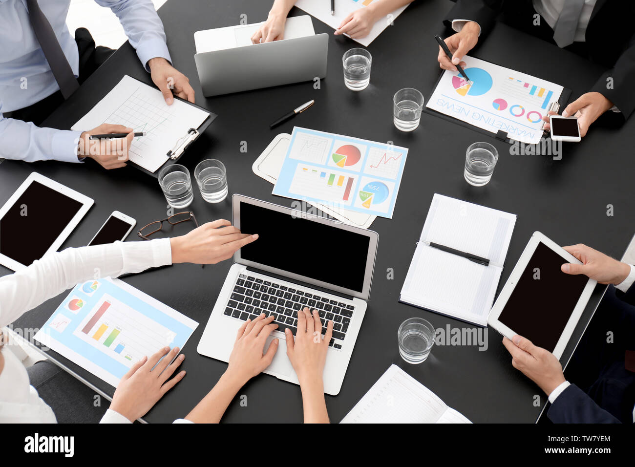 Team of young consulting experts on business meeting in office Stock ...