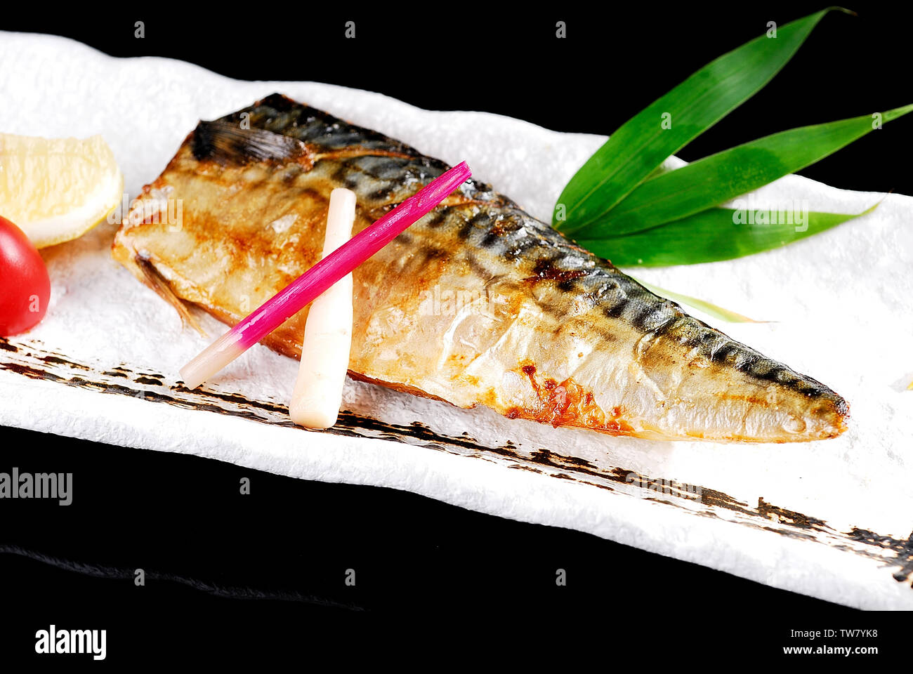 Fried blue-and-white fish Stock Photo - Alamy