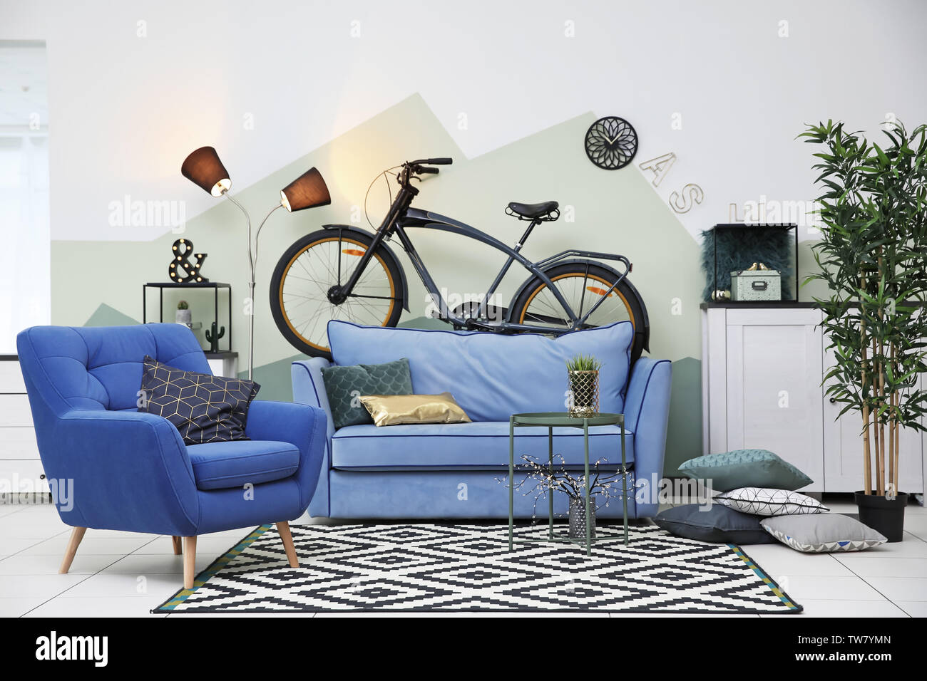Modern living room interior with stylish bicycle Stock Photo - Alamy