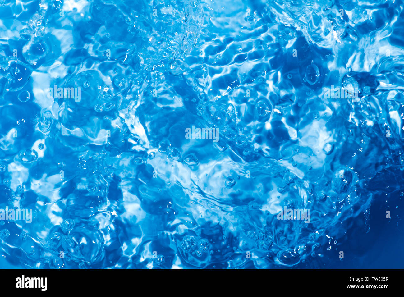 Crystal clear water ripples Stock Photo - Alamy