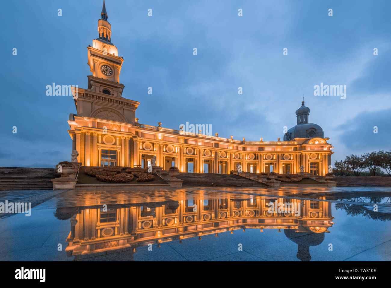 Night view of city square building lights after rain Stock Photo - Alamy